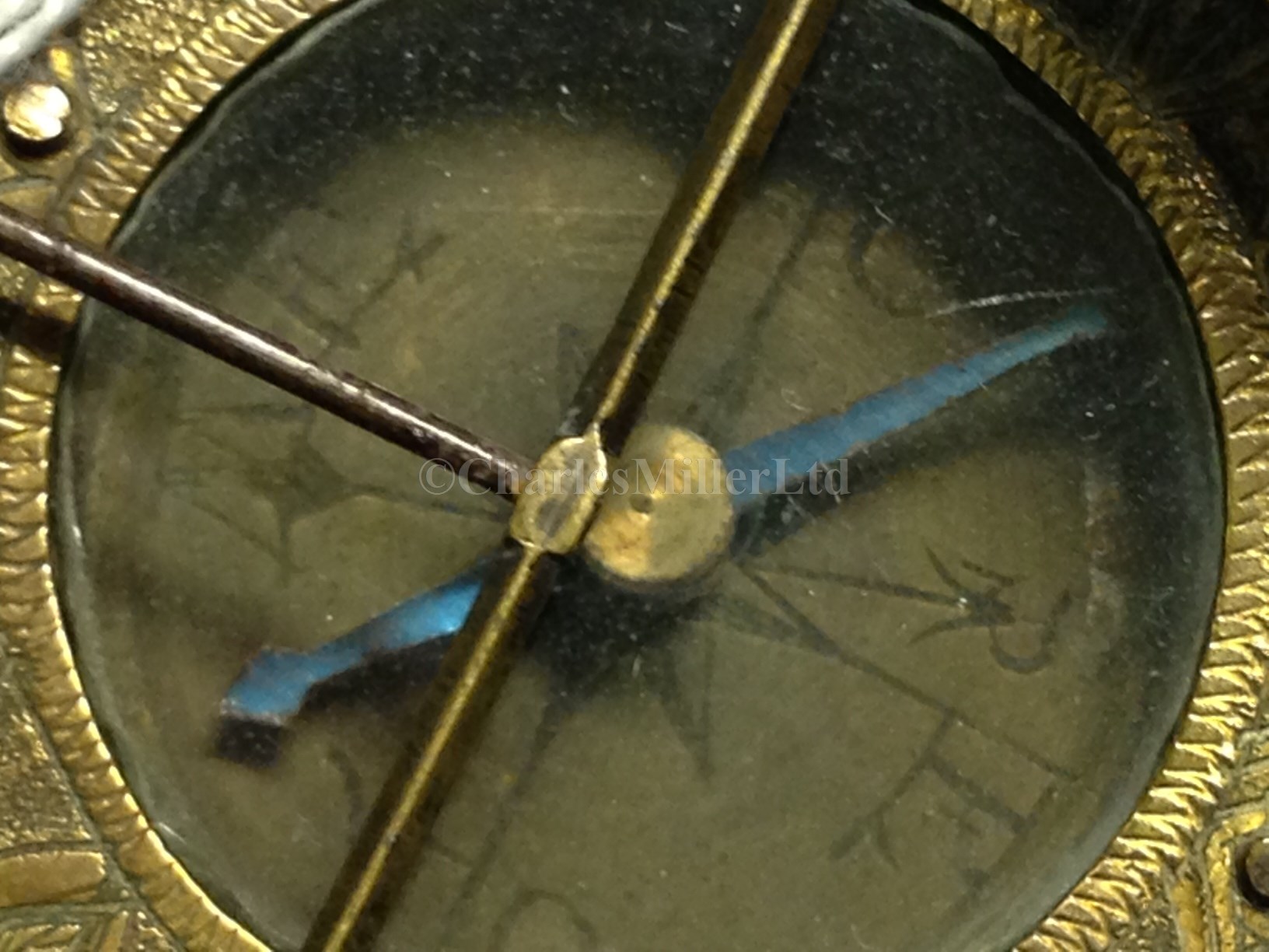 Lot 262 - AN 18TH-CENTURY BRASS POCKET COMPASS SUNDIAL.