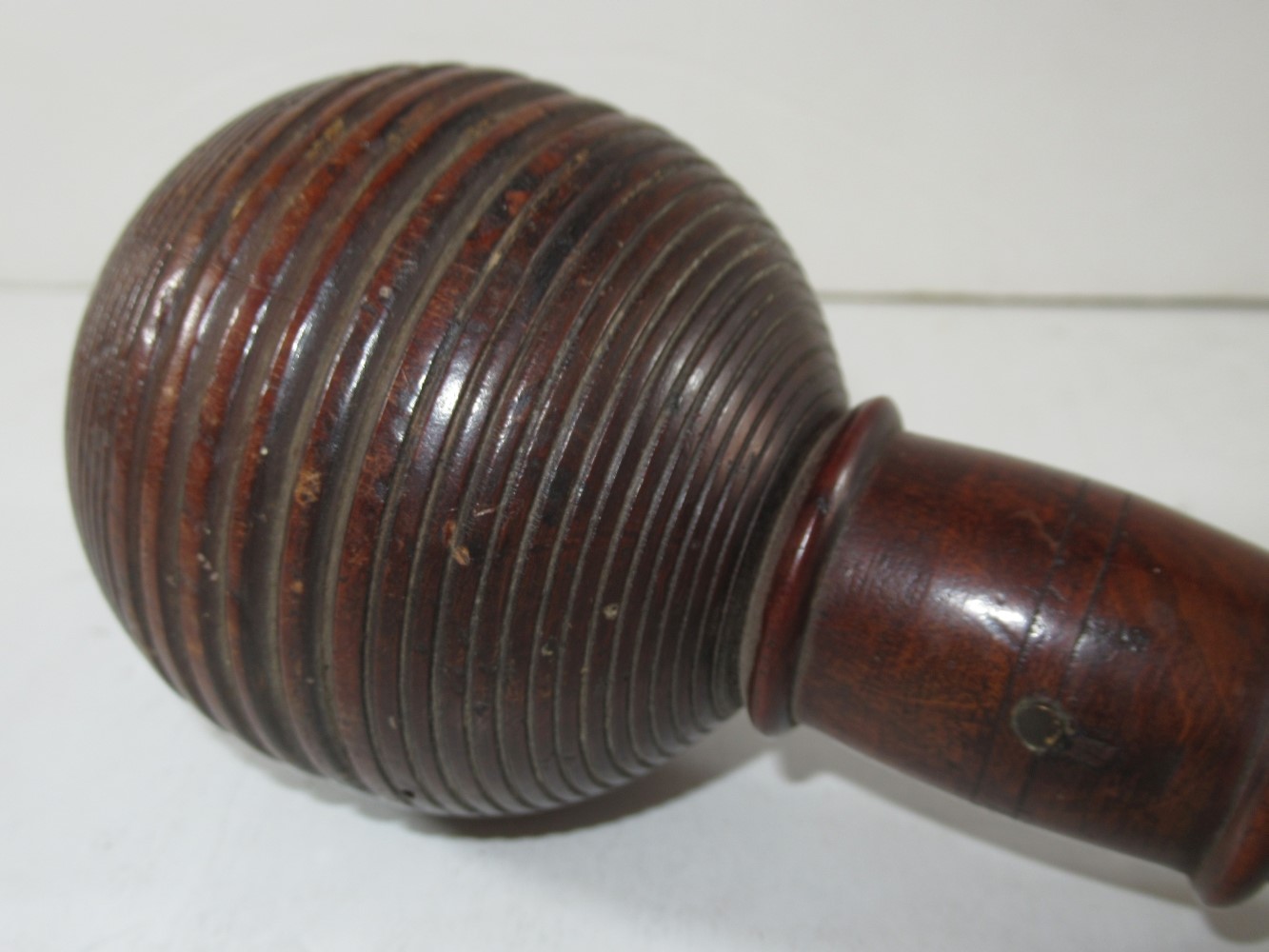 Lot 170 - AN EARLY 19TH CENTURY TURNED WOOD PRESS GANG