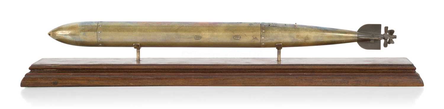 Lot 271 - A BRASS DESK MODEL FOR AN EARLY TORPEDO,