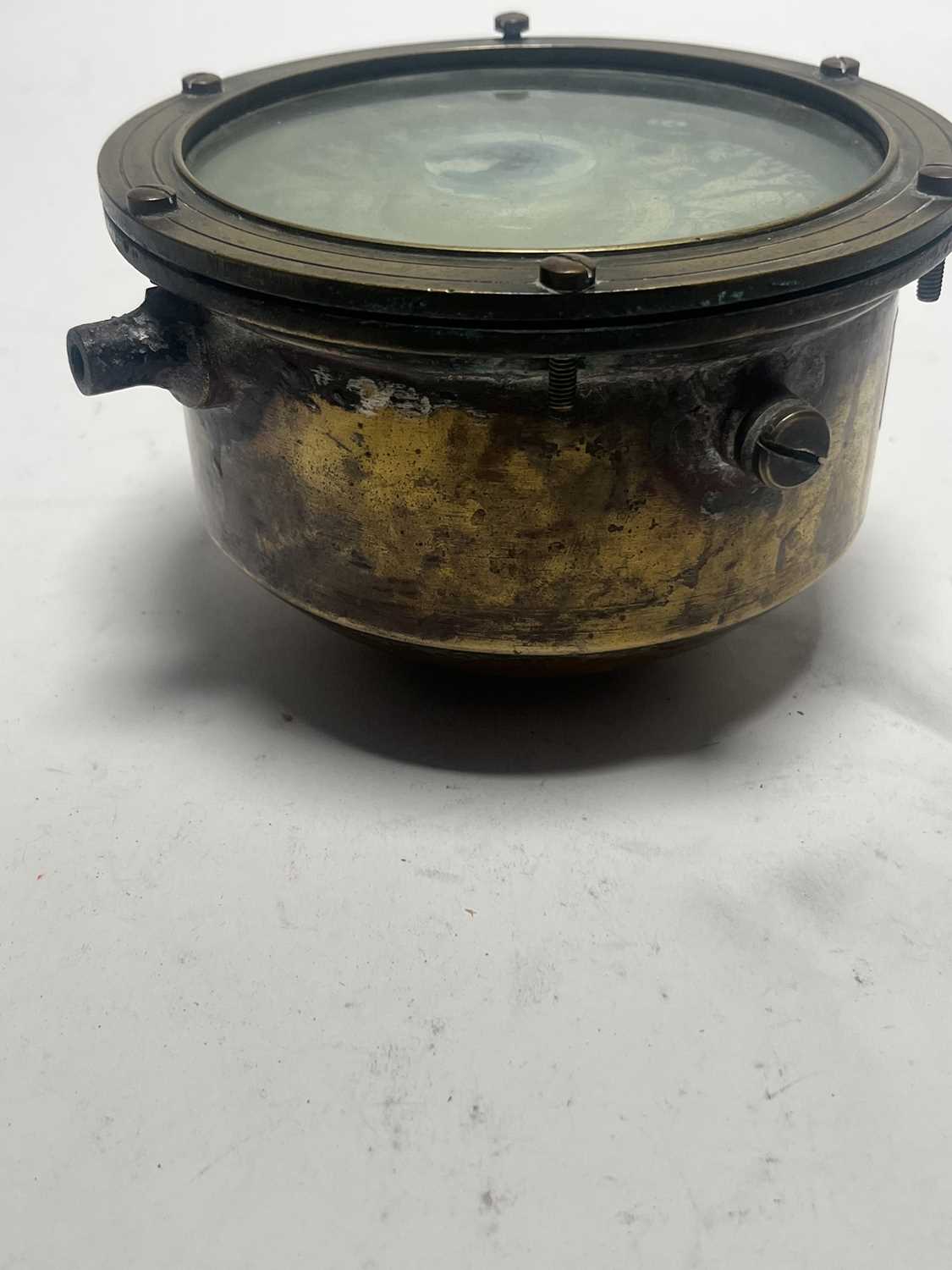 Lot 107 - AN EARLY 20TH CENTURY LIQUID FILLED COMPASS