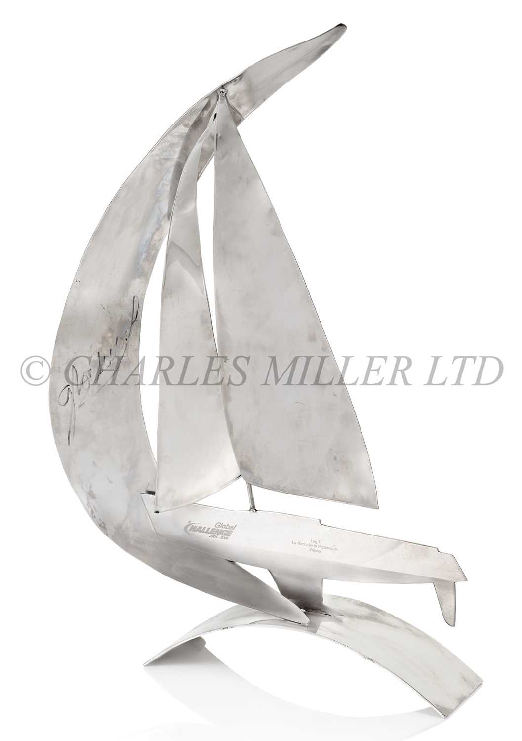 Lot 67 - A STAINLESS STEEL TROPHY FROM THE GLOBAL