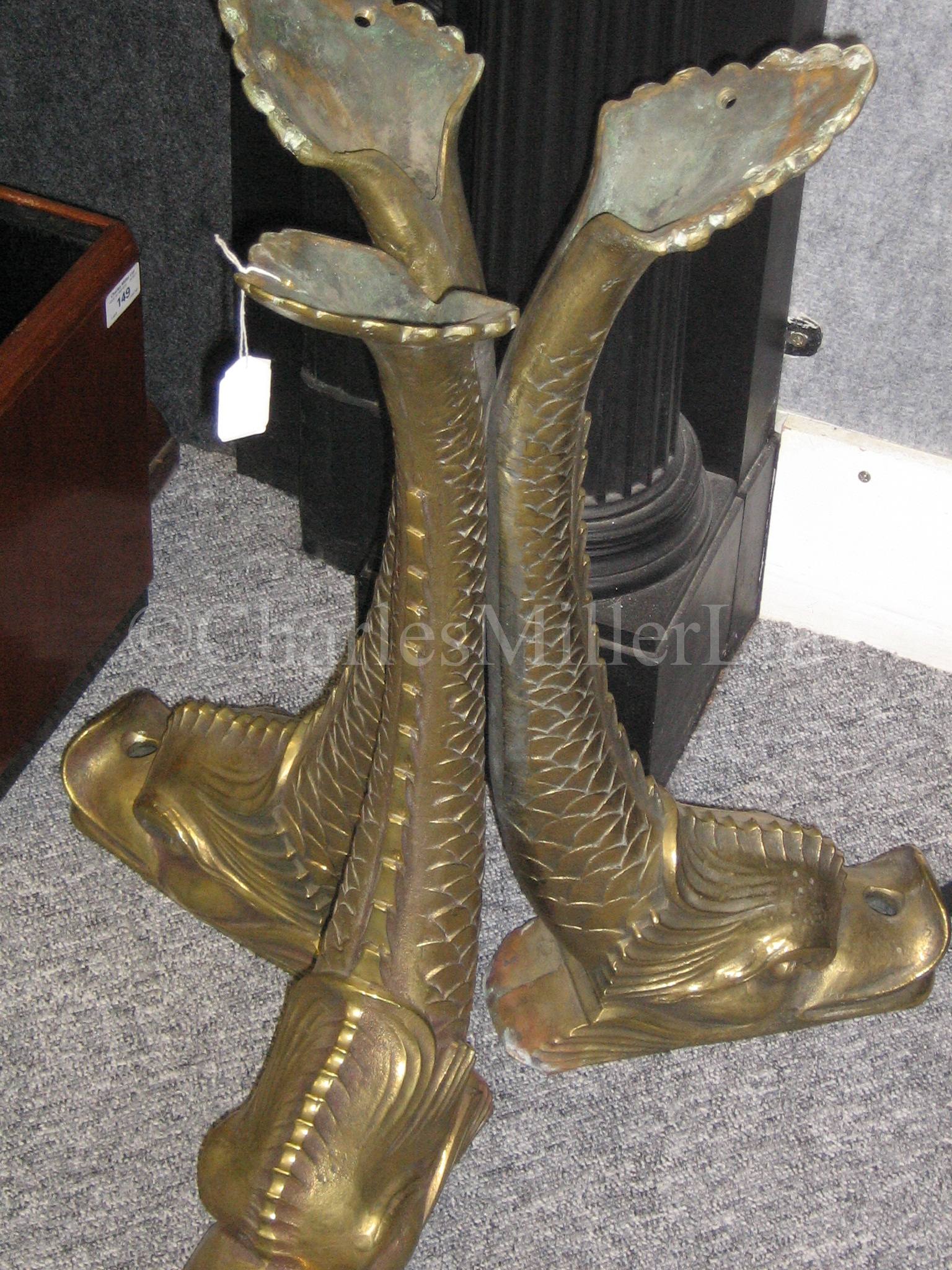 Lot 134 - A 19TH-CENTURY DECORATIVE CAST BRASS DOLPHIN.