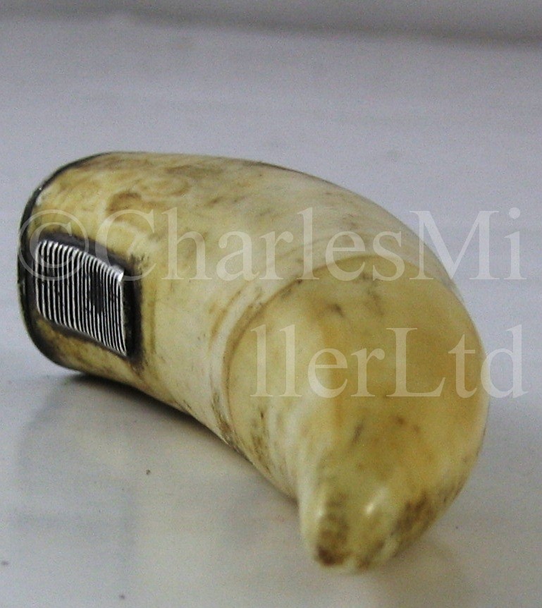 Lot 141 - AN EARLY 20TH-CENTURY MARINE IVORY AND